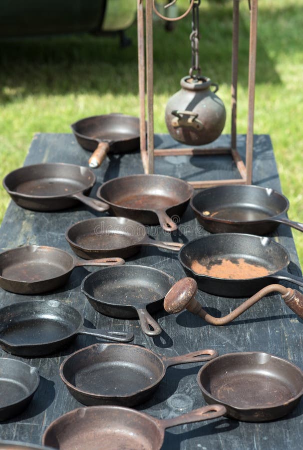 Iron pans on table stock photo. Image of market, dish - 101699948