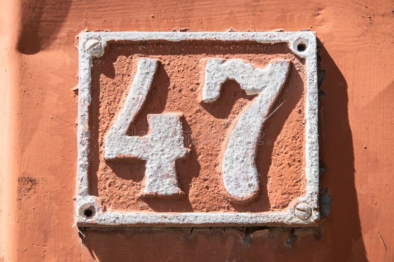 Iron plate with number 47 stock image. Image of paint - 326211687