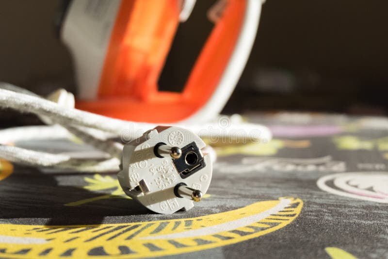 Iron Plug Against the Backdrop of the Iron in the House Stock Photo ...