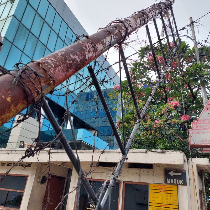 Iron Pole Entry Gate with Barbed Wire Installed Stock Image - Image of ...