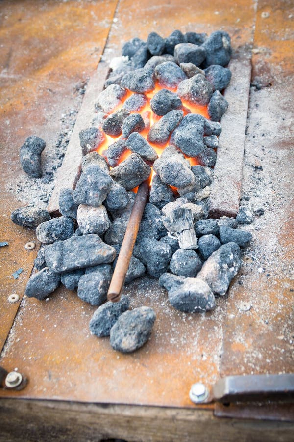 Iron Rod Put To Heat in the Hot Coals. Stock Photo - Image of fire ...