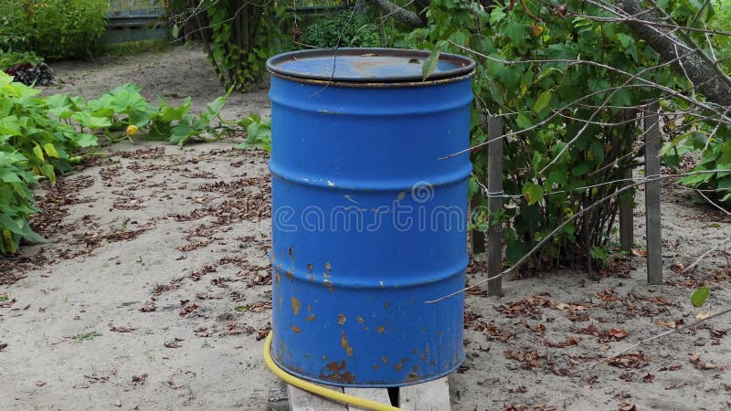 Iron Rusty Blue Barrel with Water Stock Footage - Video of barrel ...