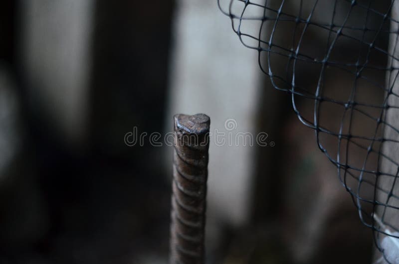 Iron Rusty Stake and Plastic Mesh Stock Photo - Image of industrial ...