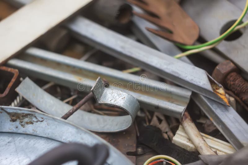 Iron scrap piled outdoors stock image. Image of steel - 293191681