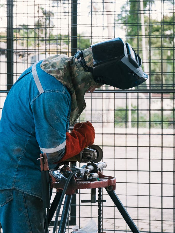 Iron Soldering, Man Working on Iron Soldering, Welding Sparks Stock ...