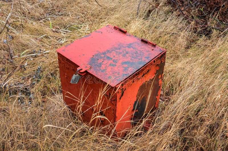Iron Square Box Closed with a Padlock, Standing on Dry Grass Stock ...