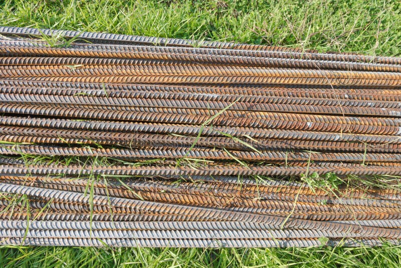 Iron stack on the grass. stock image. Image of reinforce - 94844959