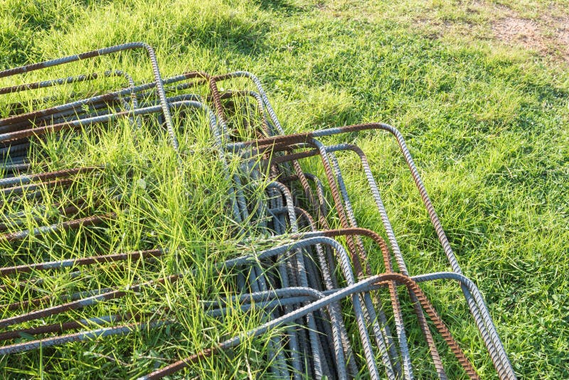 Iron stack on the grass. stock image. Image of rebar - 94846955