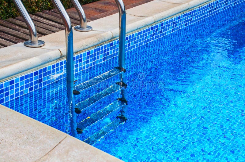 Iron Staircase in the Pool with Blue Tiles Stock Photo - Image of ...