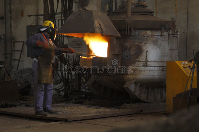 Oil Worker with Large Refinery in Background Stock Image - Image of ...