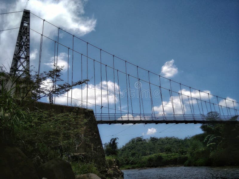 Iron Suspension Bridge from the Side Stock Image - Image of side ...