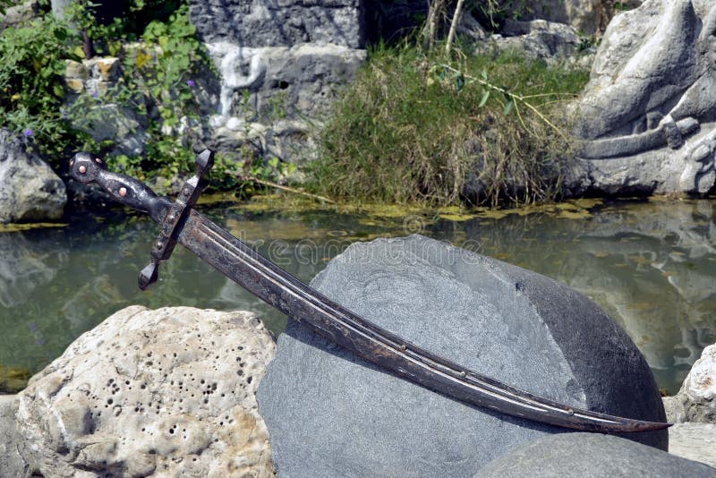 Iron sword stock image. Image of weapon, sword, river - 26251829
