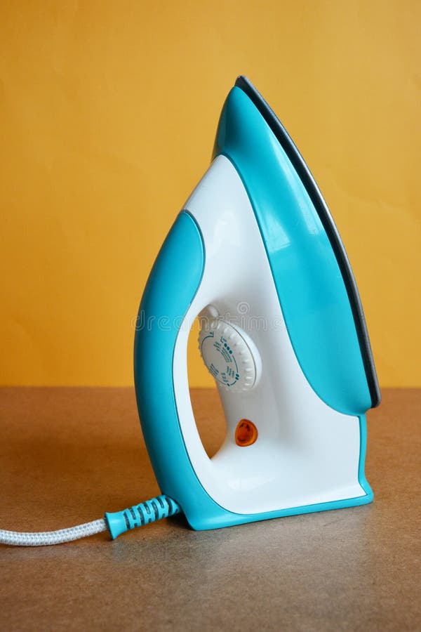 Iron on table. stock image. Image of laundry, single - 48014829