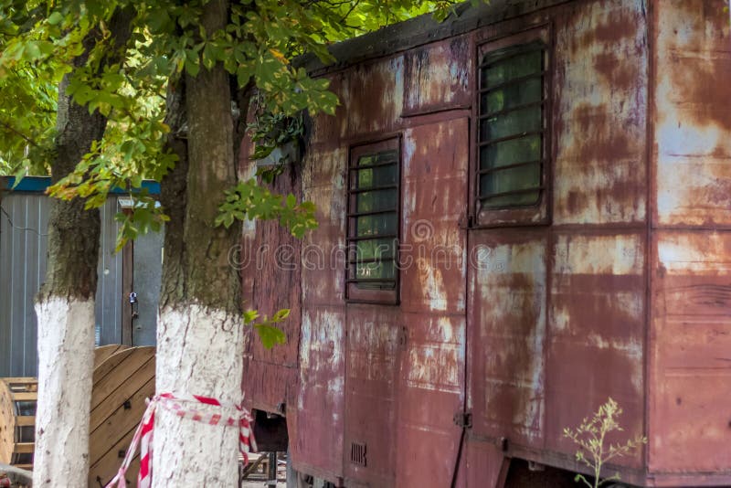An Iron Van. a Rusty Trailer Stands among the Trees Stock Photo - Image ...