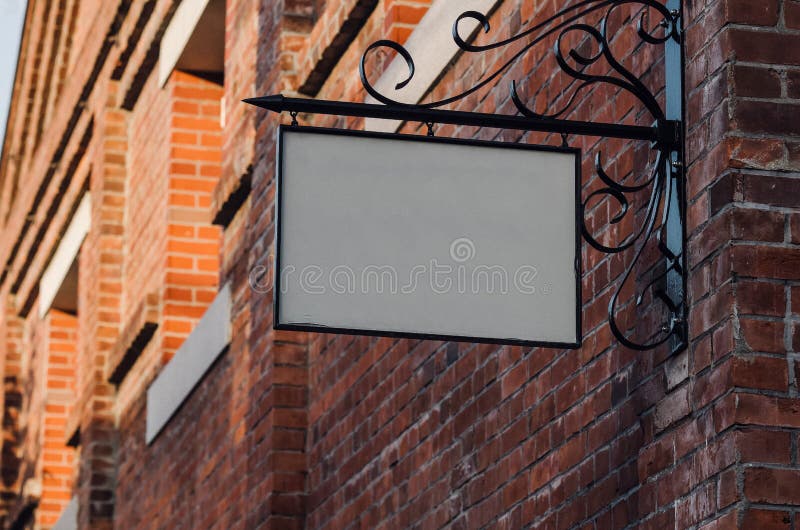 Iron Vintage Signboard on the Street Stock Image - Image of hanging ...