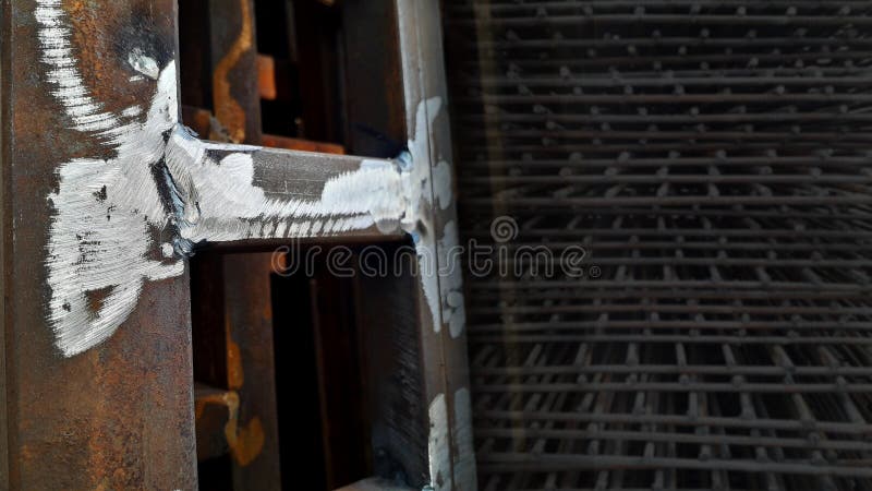 Iron Welding and Grinding Marks or Textures on Iron Pipes and Rods in a ...