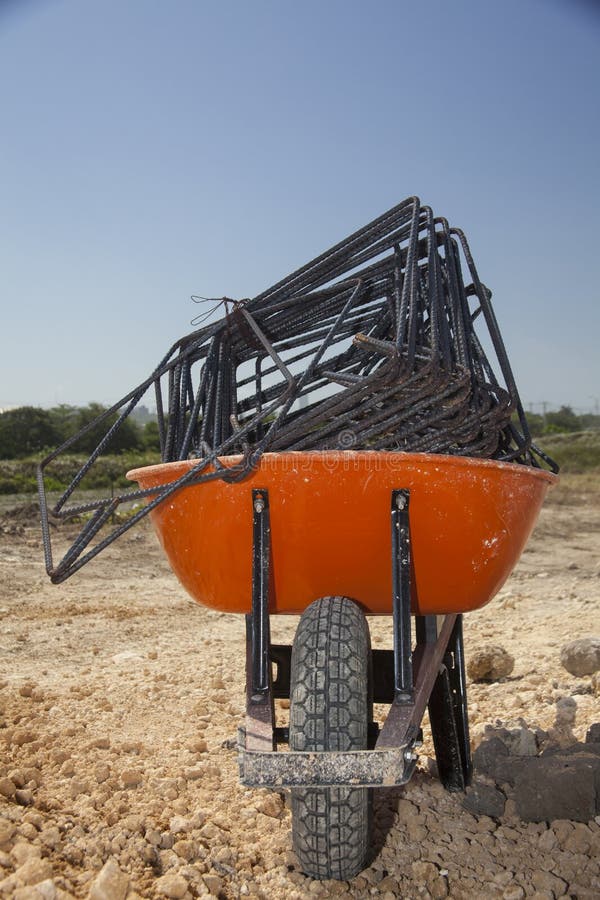 Iron and wheelbarrow stock photo. Image of construction - 70919808