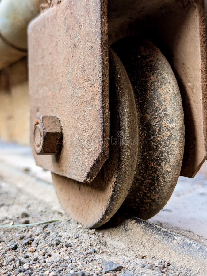 Iron Wheels that Function As a Rolling Pin for a Fence Stock Photo ...
