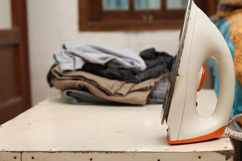Iron on the White Table, Version 2 Stock Photo - Image of apparel, blue ...