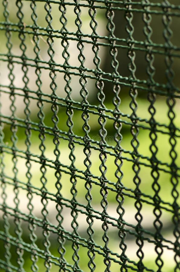 Iron wire fence stock photo. Image of green, mesh, cross - 33587108