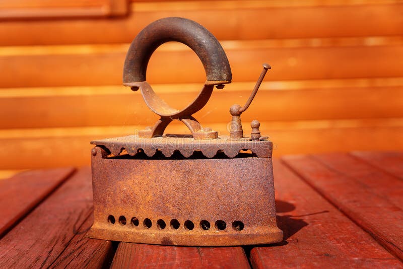 Iron on Wood. Ironing by Using Traditional Coal Burning Heat, Ancient ...