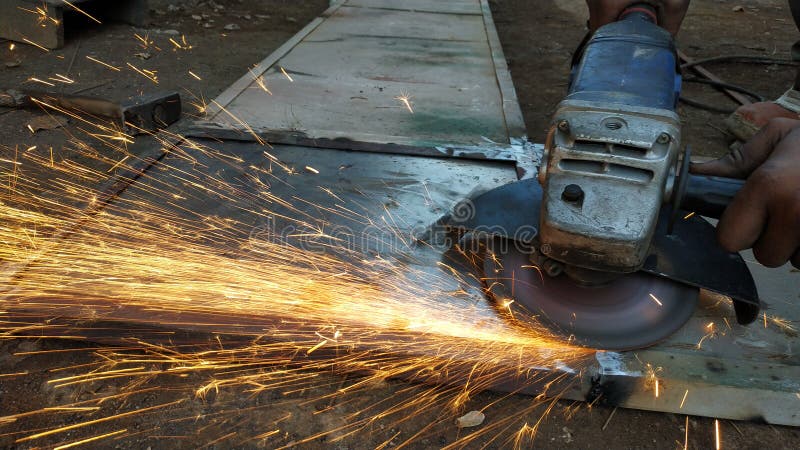An Iron Worker Doing Grinder Work Stock Image - Image of hardwork ...