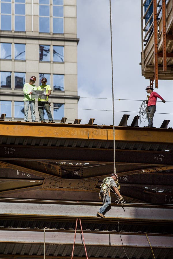 Iron Workers are Working and Reviewing Drawings Editorial Stock Photo ...