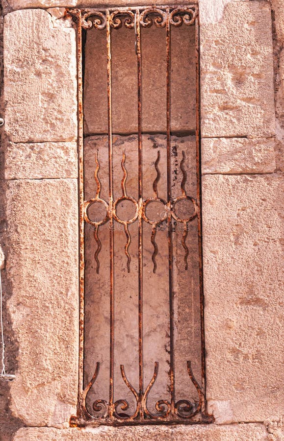 Iron Works, Enclosing a Wall Built of Limestone Block Stock Image ...