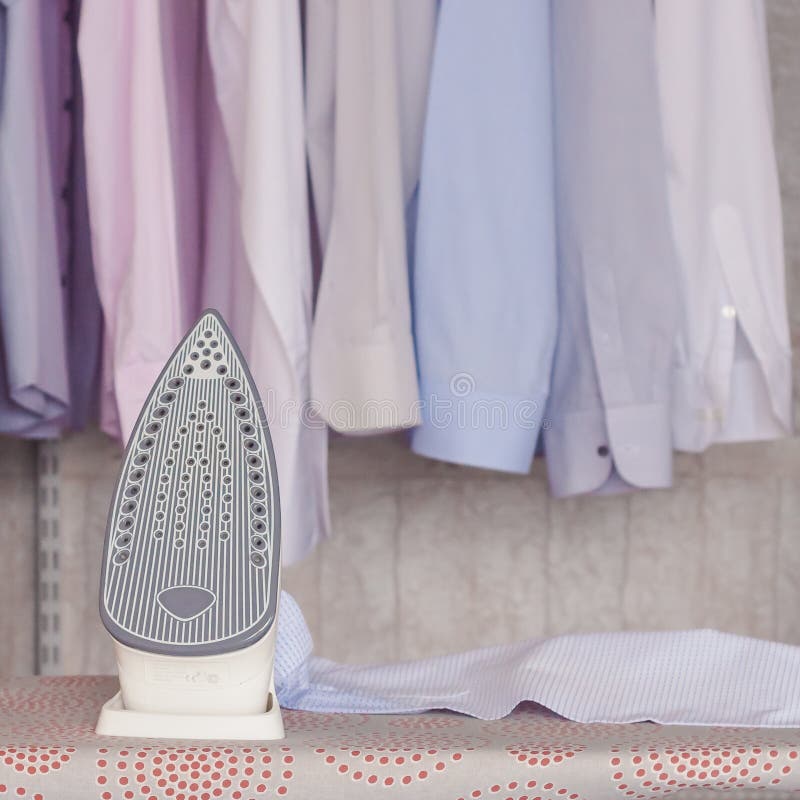 Ironed Items and Iron on Ironing Board Stock Image - Image of equipment ...