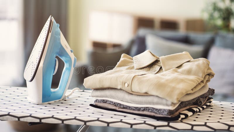 Ironing Clothes on Ironing Board Stock Photo - Image of home, housework ...