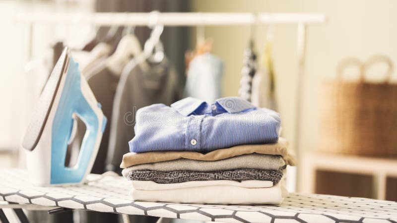 Ironing Clothes on Ironing Board Stock Photo - Image of textile ...