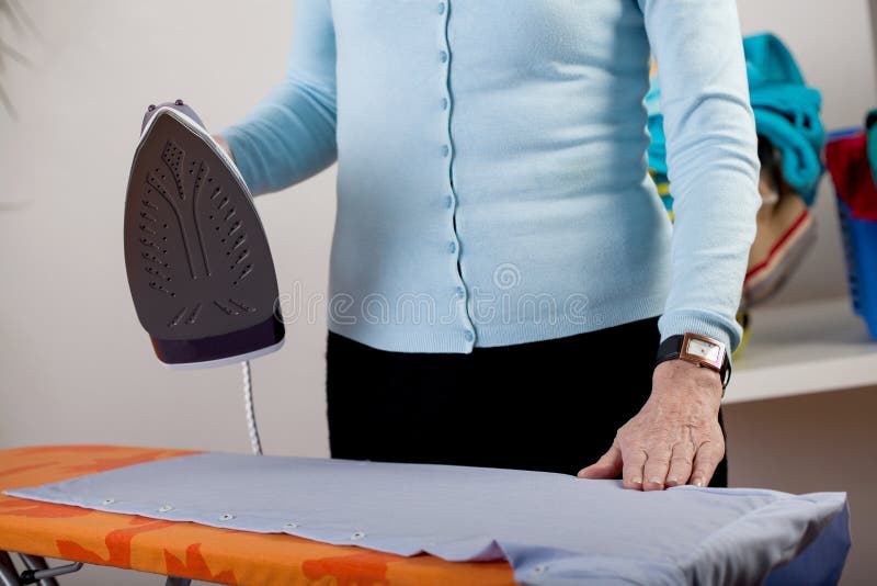 Ironing clothes closeup stock image. Image of aged, indoor - 40306779