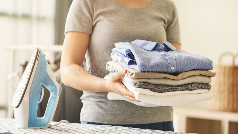 Ironing Clothes on Ironing Board Stock Photo - Image of shirt, ironing ...