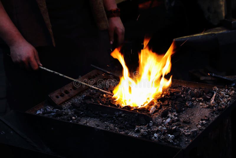 Irons in the fire stock photo. Image of blacksmith, work - 84349422