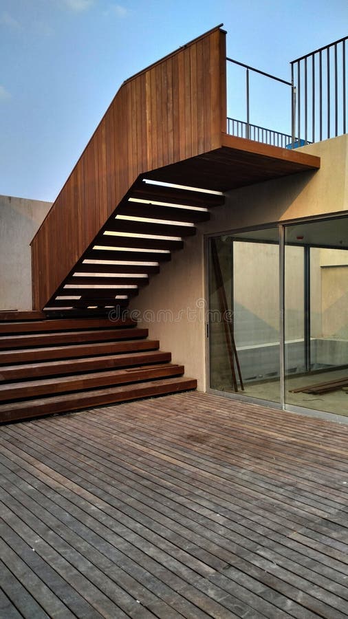 Ironwood rooftop stairs stock image. Image of wooden - 298469067