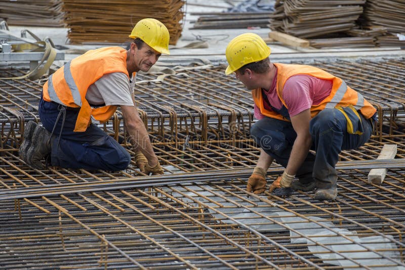 Iron Worker Tying Reinforcing Steel Bars Editorial Image - Image of ...