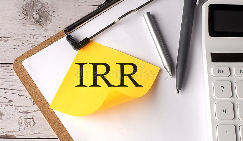 IRR Word on Yellow Sticky with Calculator, Pen and Clipboard Stock ...
