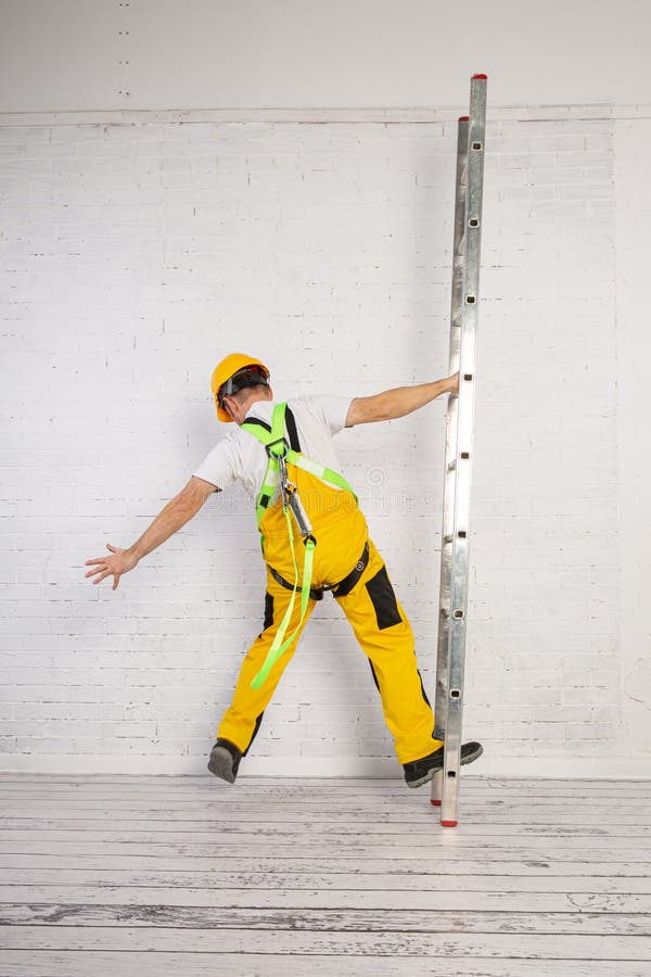 Irresponsible Use of a Ladder during Construction Work. Stock Image ...