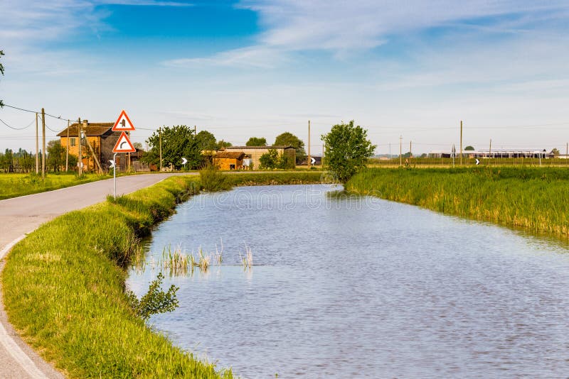Irrigation Canal Running Trough Rows of Trees Stock Photo - Image of ...