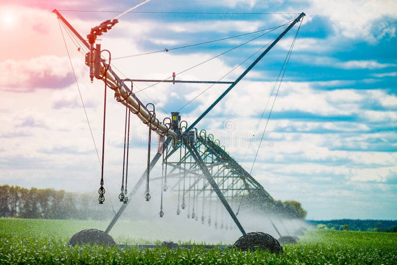 An Irrigation Pivot Watering a Field, Beautiful View Stock Photo ...