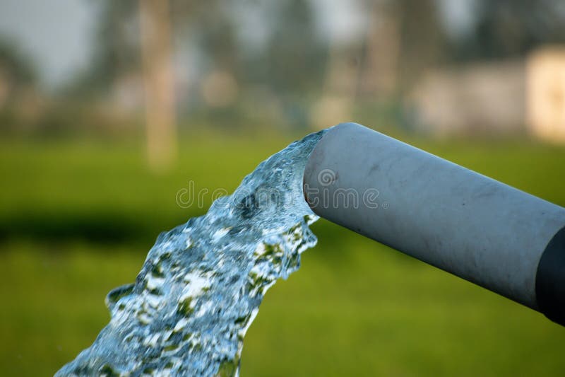 Pumping Water from the Ground To Flow into the Rice Fields Stock Image ...