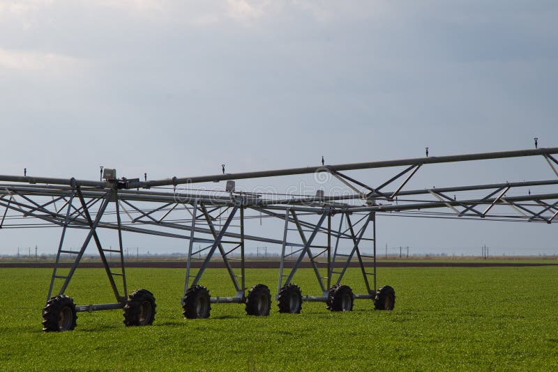 Irrigation system stock photo. Image of farm, long, grass - 24391364