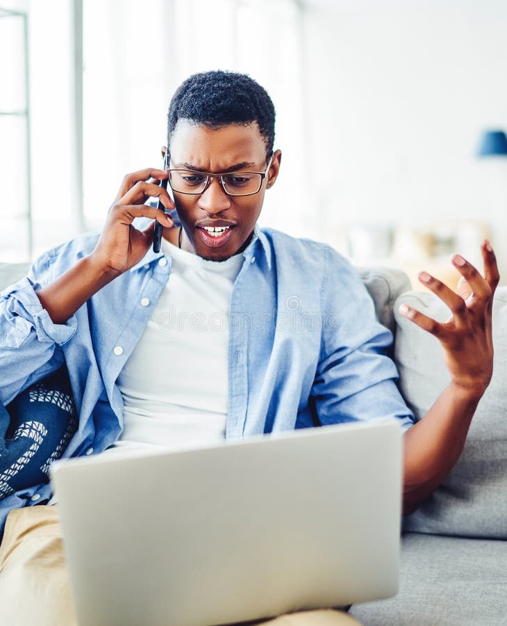 Irritated African American Man Upset with Software Failure on Laptop ...