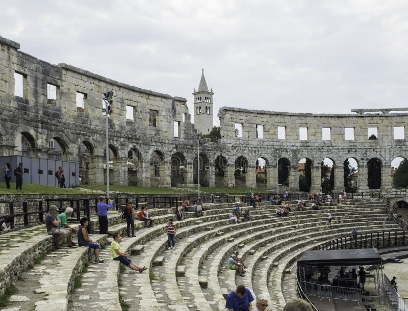 Iside of Amphitheater 1st Century AD in Pula. People on the Step ...