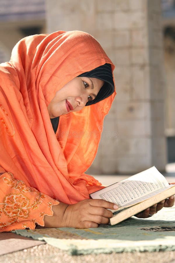 Islam, Woman Reading Koran stock image. Image of hijab - 7001711