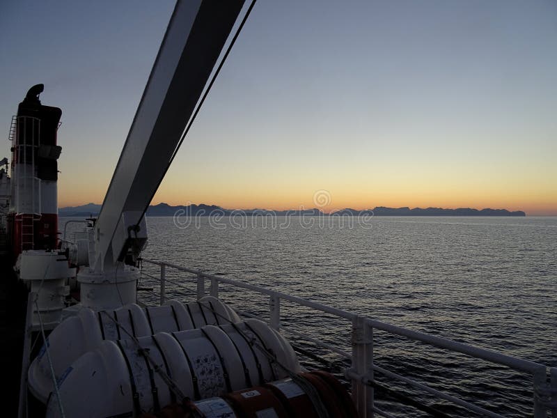 The Island is Approaching As the Sun Rises Stock Image - Image of ...