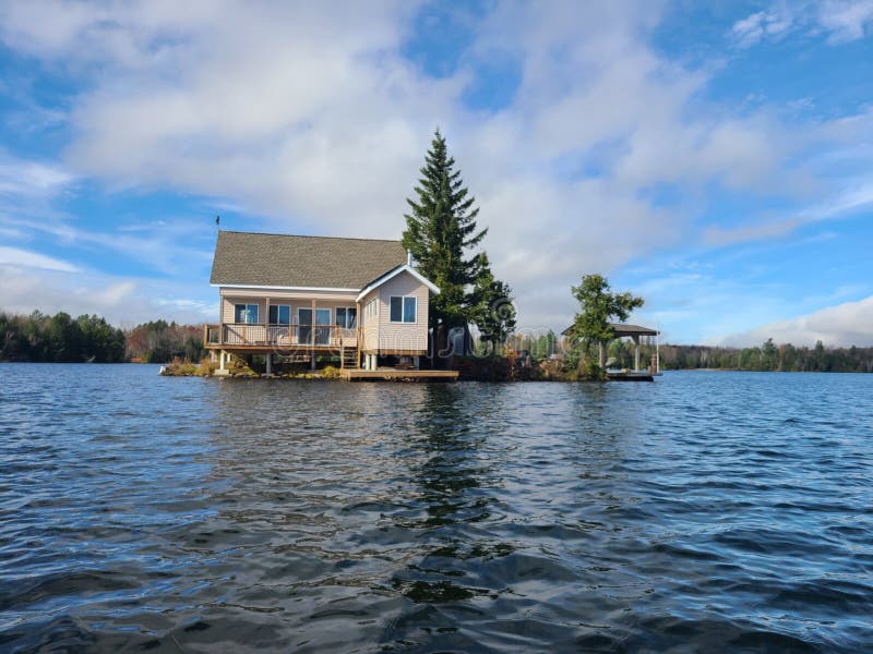 Island cottage getaway stock image. Image of beige, water - 260122017