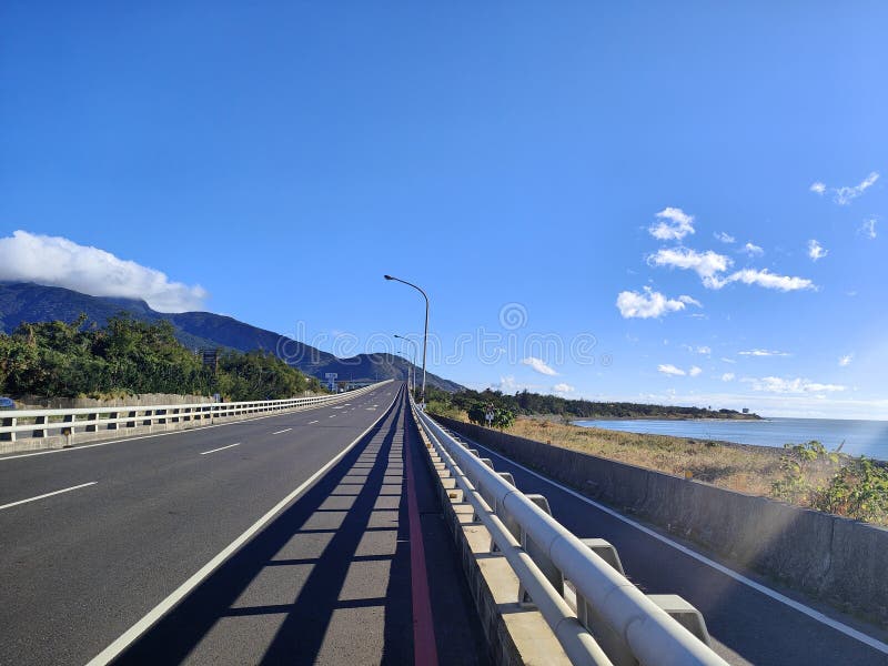 Island Edge Street View of Mountain, Beach & Sea Stock Image - Image of ...