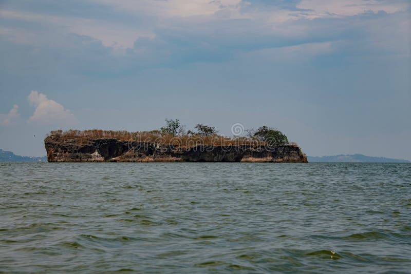 Island at Lake Victoria stock photo. Image of rock, copy - 337109990