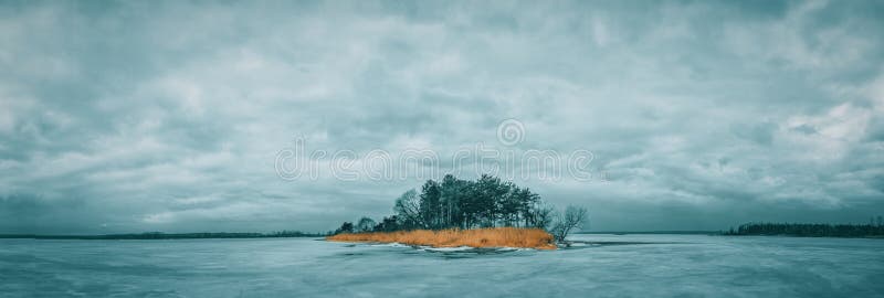 Island in the Middle of a Frozen Lake Stock Photo - Image of mountain ...